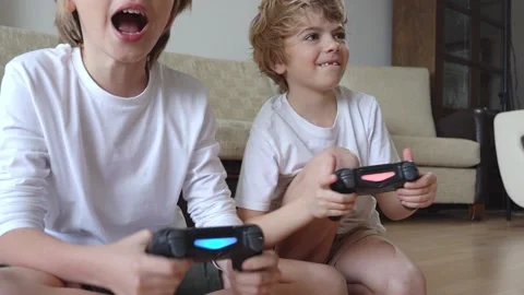 Gamer Children siblings playing video ga... | Stock Video | Pond5