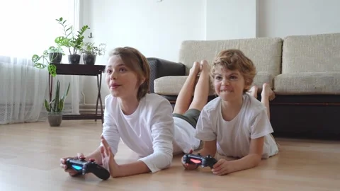 Gamer Children siblings playing video ga... | Stock Video | Pond5