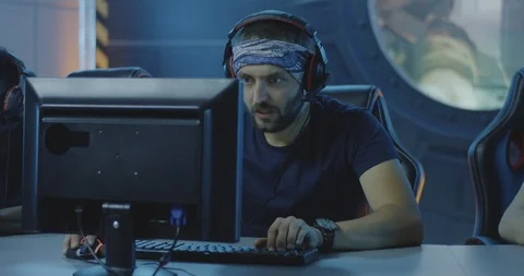 Gamer destroying keyboard after losing m... | Stock Video | Pond5