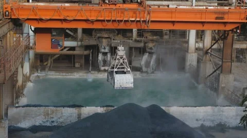 gantry crane grab granulating slag from ... | Stock Video | Pond5