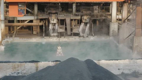 gantry crane grab granulating slag from ... | Stock Video | Pond5