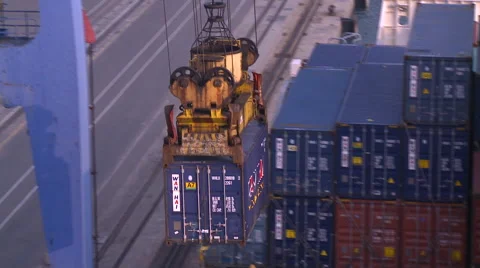 A gantry crane is unloading a container ... | Stock Video | Pond5