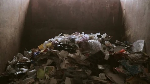 Garbage falling in container to transpor... | Stock Video | Pond5
