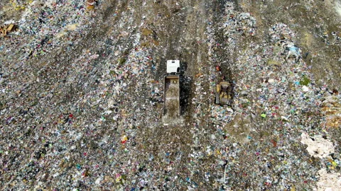 Garbage truck during unloading rubbish a... | Stock Video | Pond5