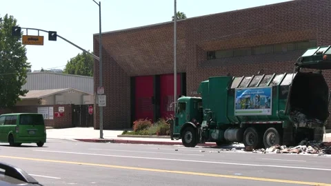 garbage truck spills trash on fire | Stock Video | Pond5