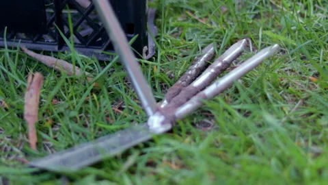 Garden tool rake chopper for gardening o... | Stock Video | Pond5