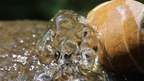 Garden well with bubbling and sparkling ... | Stock Video | Pond5