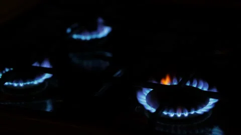 gas burners go out on the kitchen stove,... | Stock Video | Pond5