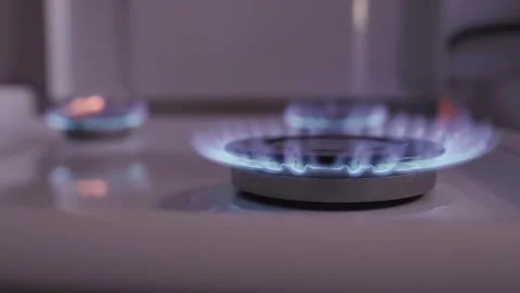 gas stove with fire, close-up side view ... | Stock Video | Pond5