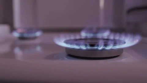 gas stove with fire, close-up side view ... | Stock Video | Pond5
