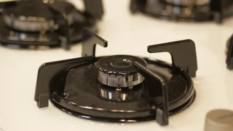 gas stove letting out of blue flame | Stock Video | Pond5