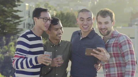 Gay Friends Take A Photo Together At Sun... | Stock Video | Pond5