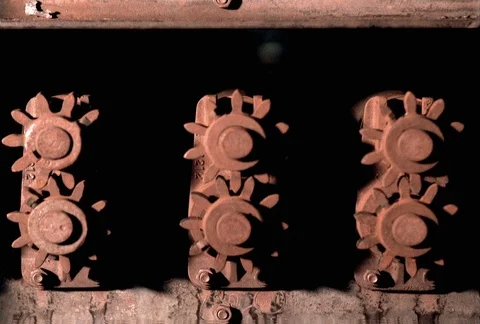 Gears with interlocking teeth rotating i... | Stock Video | Pond5