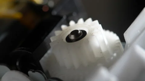 Gears rotating in mechanical device. Mac... | Stock Video | Pond5