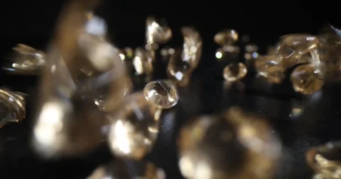 Gemstones diamonds are falling on black ... | Stock Video | Pond5