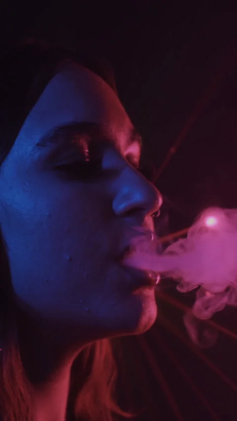 Gen Z Asian Woman Blowing Vape Smoke in ... | Stock Video | Pond5