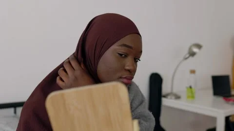Gen Z black woman looking at mirror whil... | Stock Video | Pond5