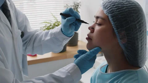 Gen Z Girl Getting Her Face Marked by Do... | Stock Video | Pond5