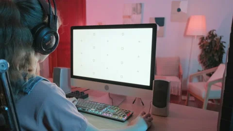 Gen Z Girl Playing PC Game at Night | Stock Video | Pond5