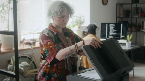 Gen Z Girl with Prosthetic Arm Scanning ... | Stock Video | Pond5