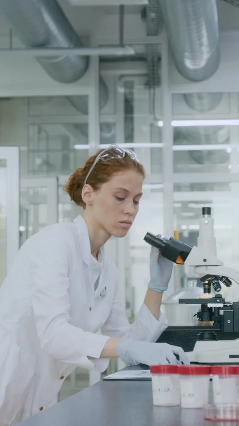 Gen Z Microbiologist Examining Sample un... | Stock Video | Pond5