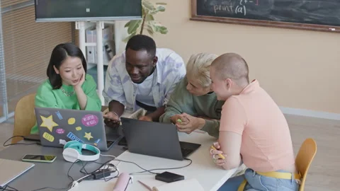 Gen Z Students Coding on Laptop Together... | Stock Video | Pond5