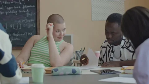 Gen Z Students Writing Test and Discussi... | Stock Video | Pond5