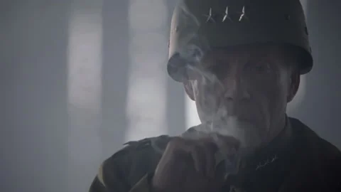 General Patton smoking a cigar in bunker... | Stock Video | Pond5