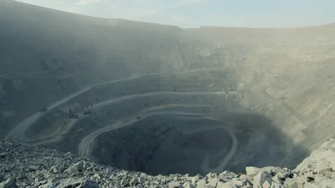 General view of a deep dusty quarry with... | Stock Video | Pond5