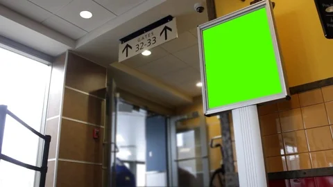 Generic green screen sign at airport ter... | Stock Video | Pond5