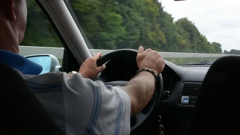 German old man driving car very fast and... | Stock Video | Pond5
