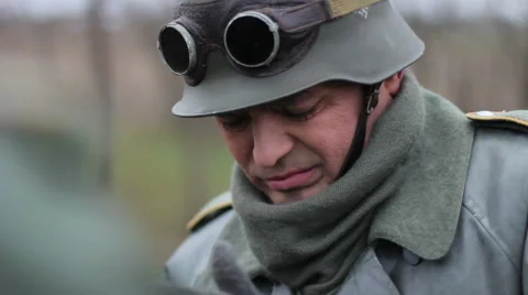 German soldier opens stew. WW2 reconstru... | Stock Video | Pond5
