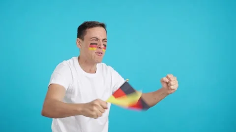 German supporter screaming and waving a ... | Stock Video | Pond5
