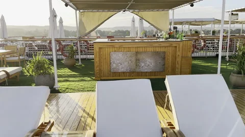 Get the perfect tan on the rooftop loung... | Stock Video | Pond5