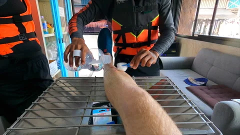 Getting first aid a little injury on the... | Stock Video | Pond5