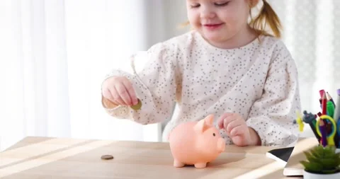 Getting your child into saving from an e... | Stock Video | Pond5