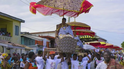 Ghana: African queen carried high in a p... | Stock Video | Pond5