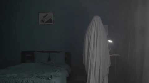 Ghost in apartment, man covered with a w... | Stock Video | Pond5