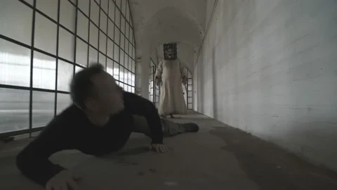 Ghost of fat woman with rusty cage on he... | Stock Video | Pond5