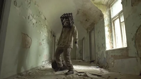 Ghost of maniac with cage on his head dr... | Stock Video | Pond5