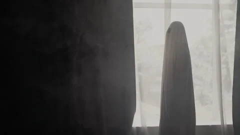 Ghost in the room standing near the wind... | Stock Video | Pond5