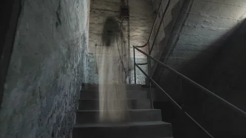 A ghost of a woman wanders the stairs of... | Stock Video | Pond5