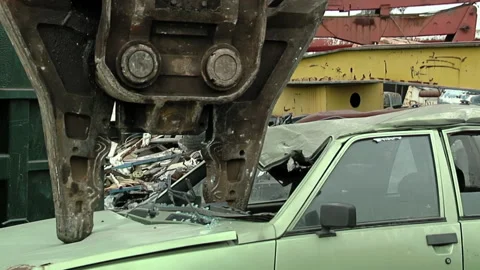 Giant Claw of Junkyard Crane Grabbing an... | Stock Video | Pond5