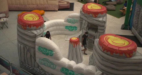 giant inflatables inside shopping mall, ... | Stock Video | Pond5