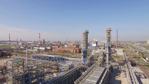 Giant oil refinery in agriculture crops ... | Stock Video | Pond5