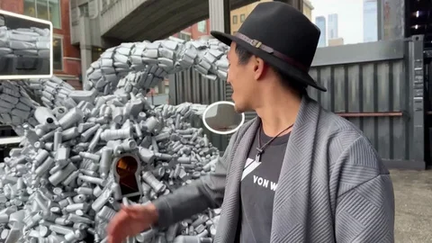 Giant plastic waste installation aims to... | Stock Video | Pond5