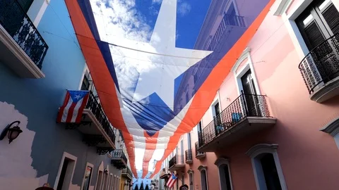 Giant sky floating Puerto Rico Flag Call... | Stock Video | Pond5