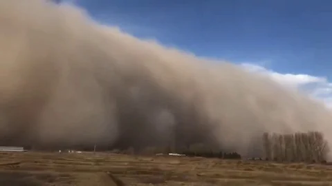 Giant wall of sand shrouds Chinese city | Stock Video | Pond5