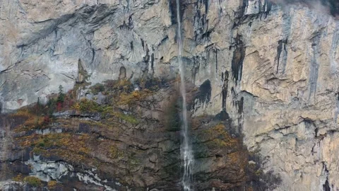Giant waterfall over the mountain rocks ... | Stock Video | Pond5