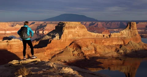 Girl backpacking in rugged Arizona plate... | Stock Video | Pond5